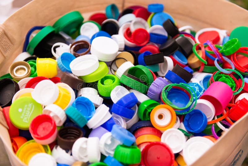 Plastic caps in a bag editorial photo. Image of concept - 179746446