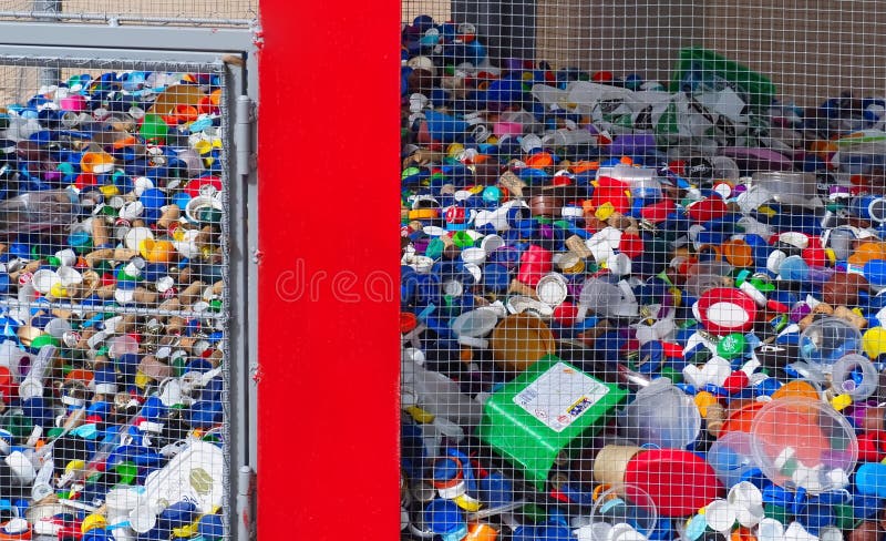Plastic Used Caps from Bottles in a Container for Recycling Editorial ...