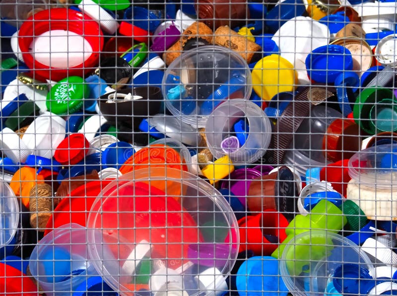 Plastic Used Caps from Bottles in a Container for Recycling Editorial ...