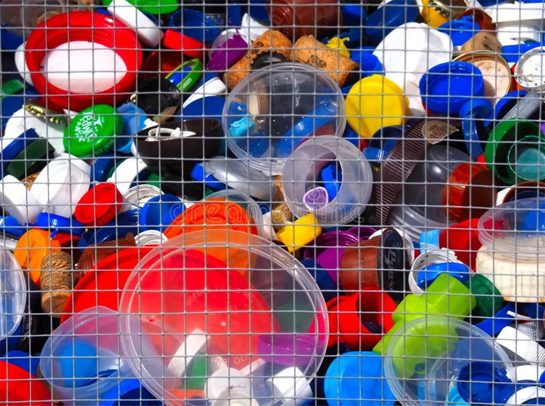 Plastic Used Caps from Bottles in a Container for Recycling Editorial ...