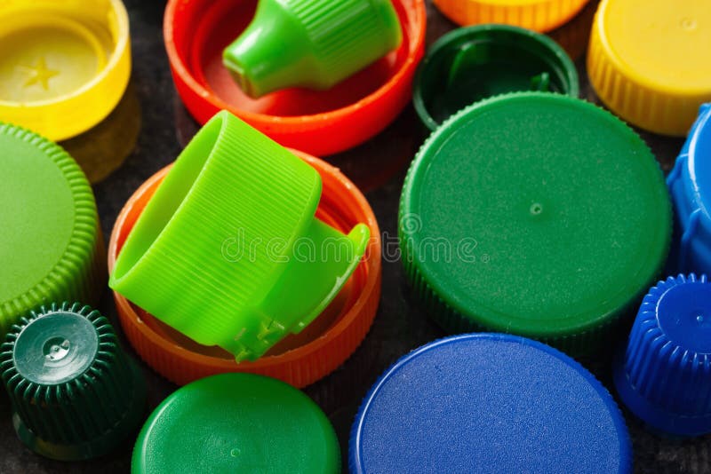 Plastic Caps. a Bunch of Colorful Plastic Caps. Recycling of Plastic ...