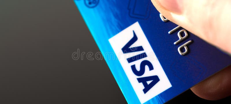 VISA card in hand editorial stock photo. Image of closeup - 100165163
