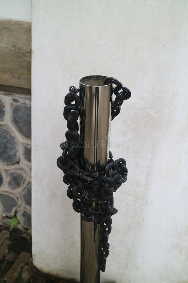Plastic Chain Wrapped Around an Iron Pipe Stock Image - Image of ...