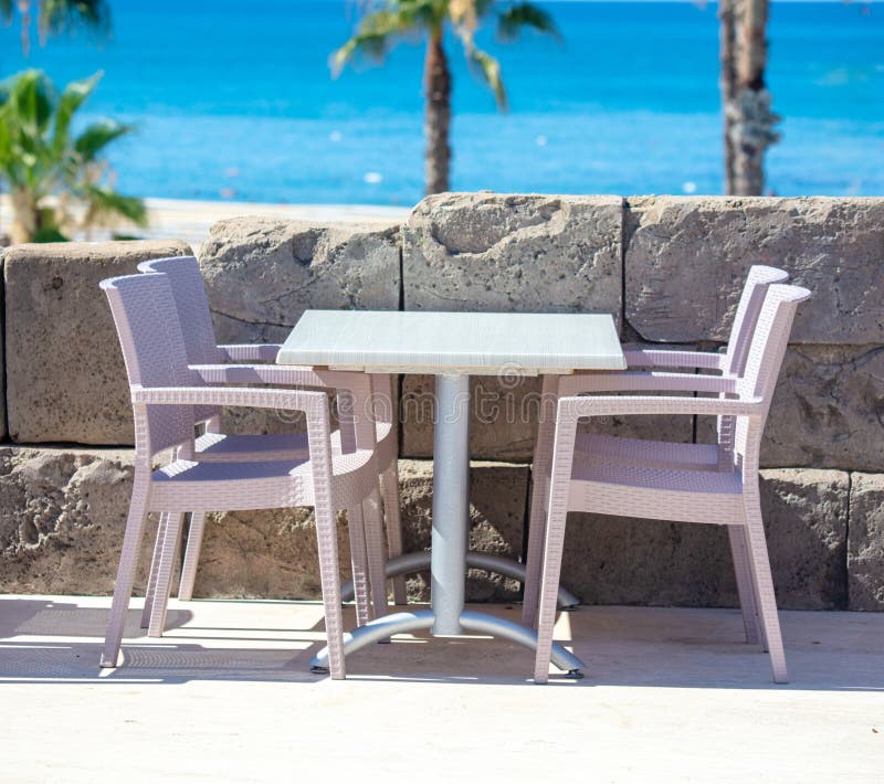 Plastic Chairs and Tables in a Restaurant. Stock Image - Image of ...