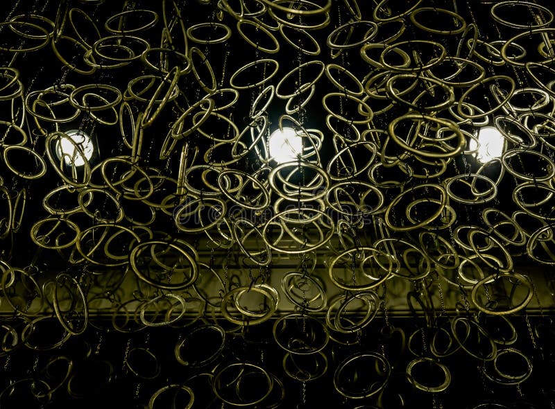 Plastic Circles Dangling from Ceiling Light Fixture Stock Photo - Image ...