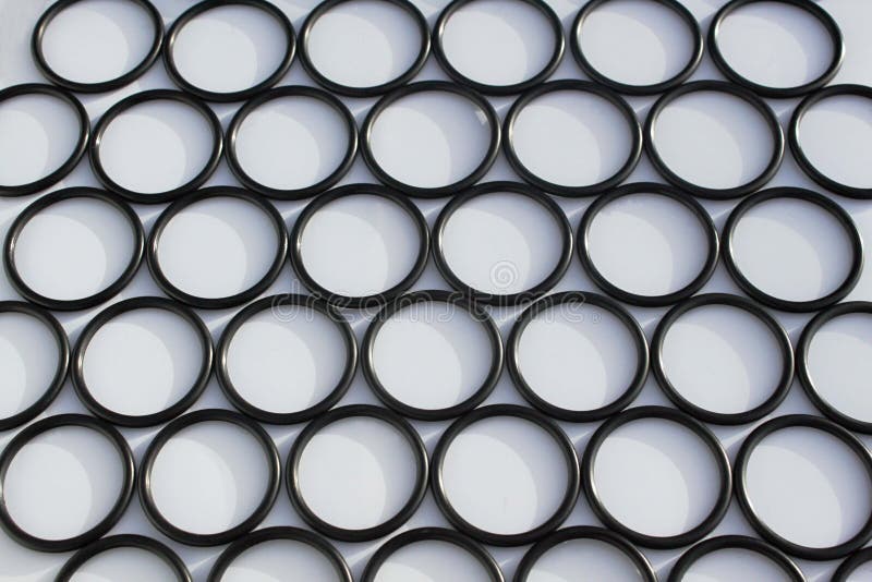 Plastic Circles of the Same Diameter on a White Background, Abstraction ...