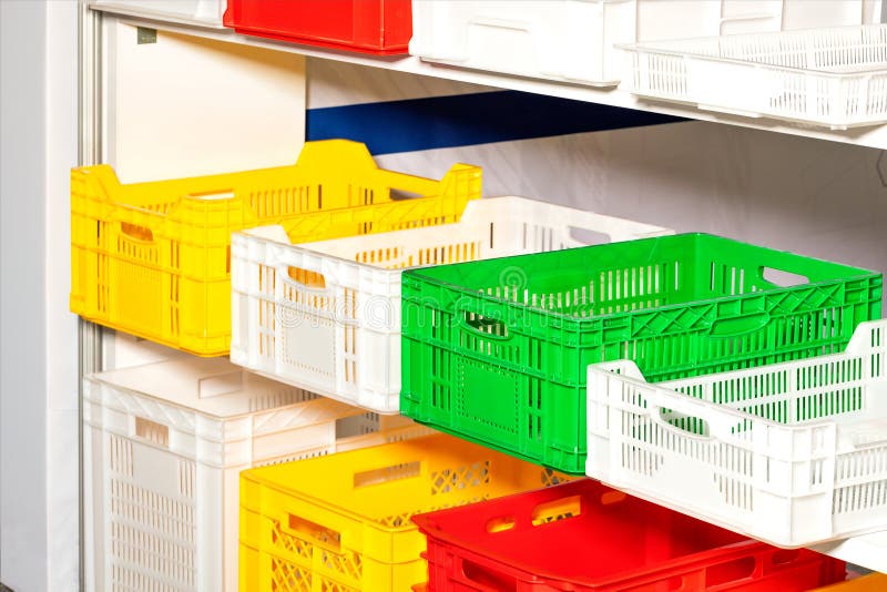 Containers Colored Plastic Boxes on a Warehouse Shelf Stock Photo ...