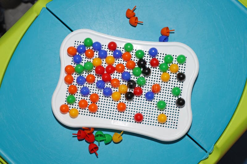 Plastic Colored Mosaic Game on the Table Stock Photo - Image of ...