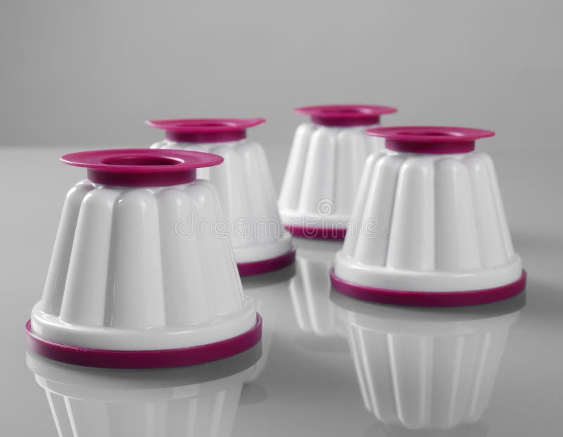 Plastic Colorful Pudding Moulds Stock Photo - Image of kitchen ...