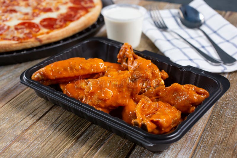 Plastic Container of Buffalo Wings, Chicken Wings Stock Image - Image ...