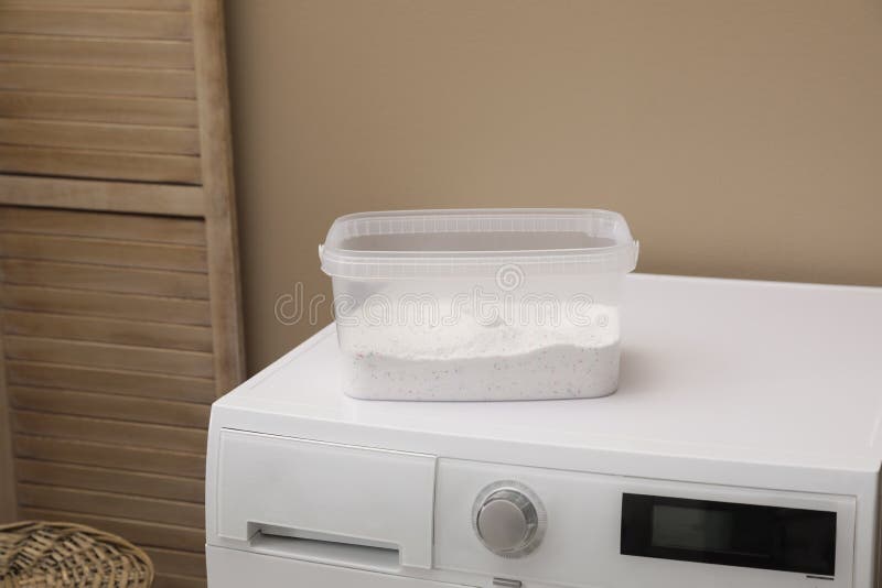 Plastic Container with Detergent Powder on Washing Machine in Laundry ...