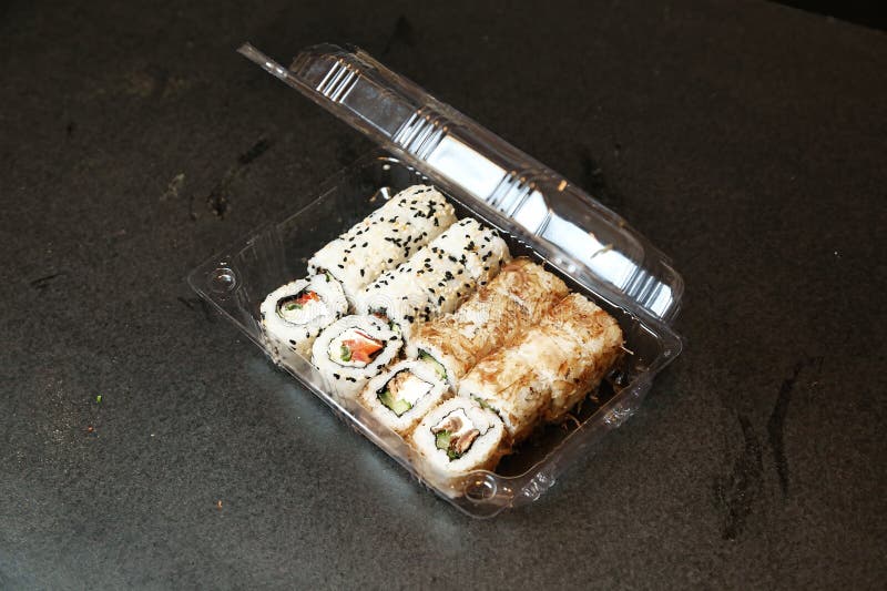 Plastic Container Filled with Food on Table Stock Photo - Image of ...