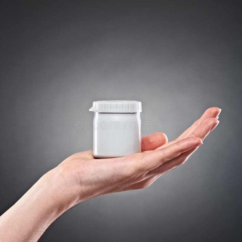Plastic container on hand stock photo. Image of lotion - 41924392