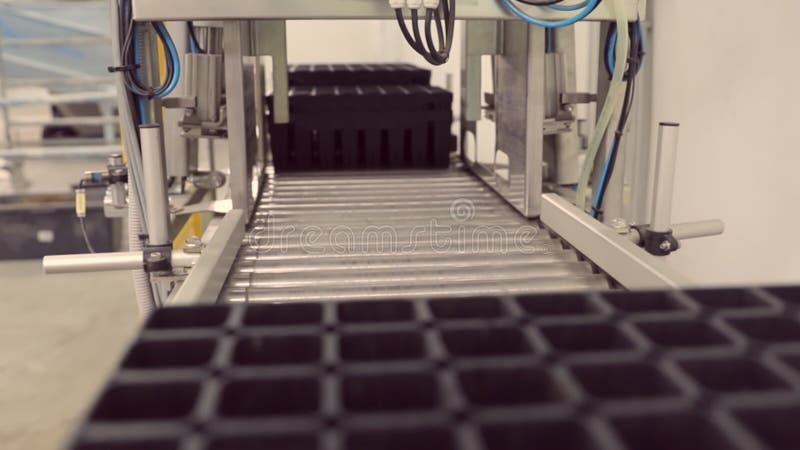 The Plastic Container Moves Along the Industrial Line. Modern ...