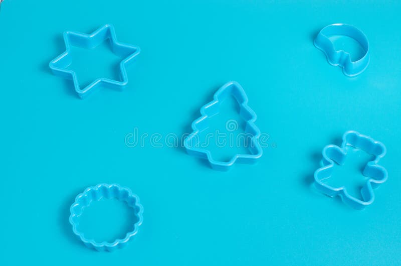 Plastic Cookie Cutter on a Blue Background Stock Image - Image of ideas ...