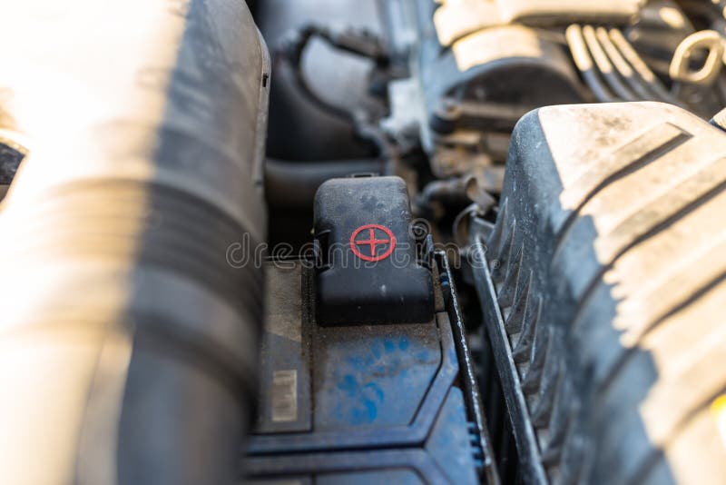 The Plastic Cover of the Positive Battery Cell Tip with the Red Plus ...