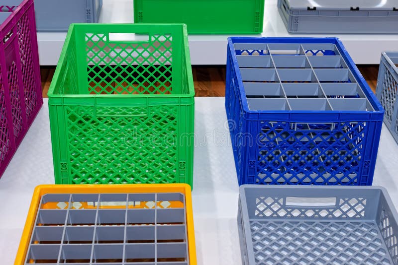 Plastic Crates, Containers of Various Colors and Sizes Stock Photo ...