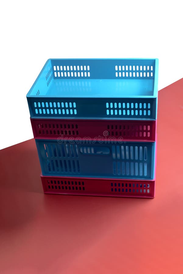 Plastic Crates, Stacked in Many Pieces on a White Background,with ...