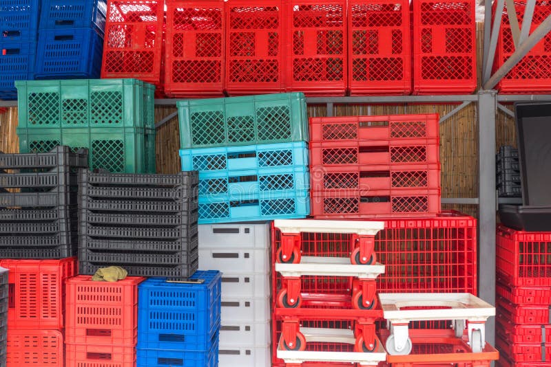 Plastic Crates, Containers of Various Colors and Sizes Stock Photo ...