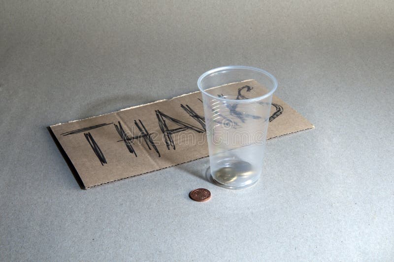 A plastic cup and coins stock image. Image of financial - 21849539