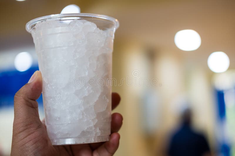 Plastic Cup Filled with Crushed Ice in Hand Stock Image - Image of ...