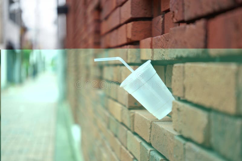 Plastic Cup Mockup with Straw Stuck in Brick Wall with Street View ...