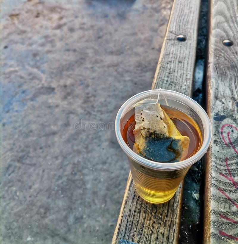 Plastic Cup with Tea on Wooden Bench Stock Image - Image of drink ...