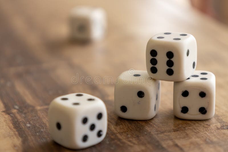 Plastic Dice Stacked on a Wooden Surface Stock Image - Image of ...
