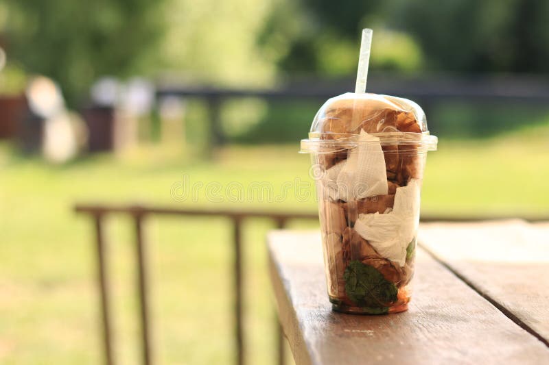 Plastic Disposable Cup with Trash Inside, Close-up Stock Photo - Image ...