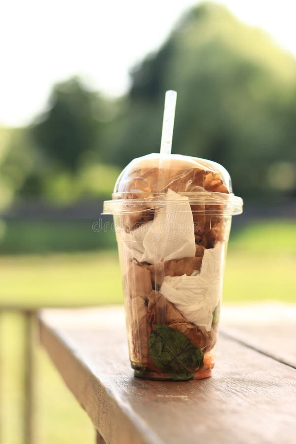 Plastic Disposable Cup with Trash Inside, Close-up Stock Photo - Image ...