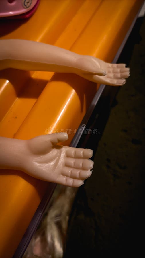 Plastic doll hands stock image. Image of dessert, doll - 242844723
