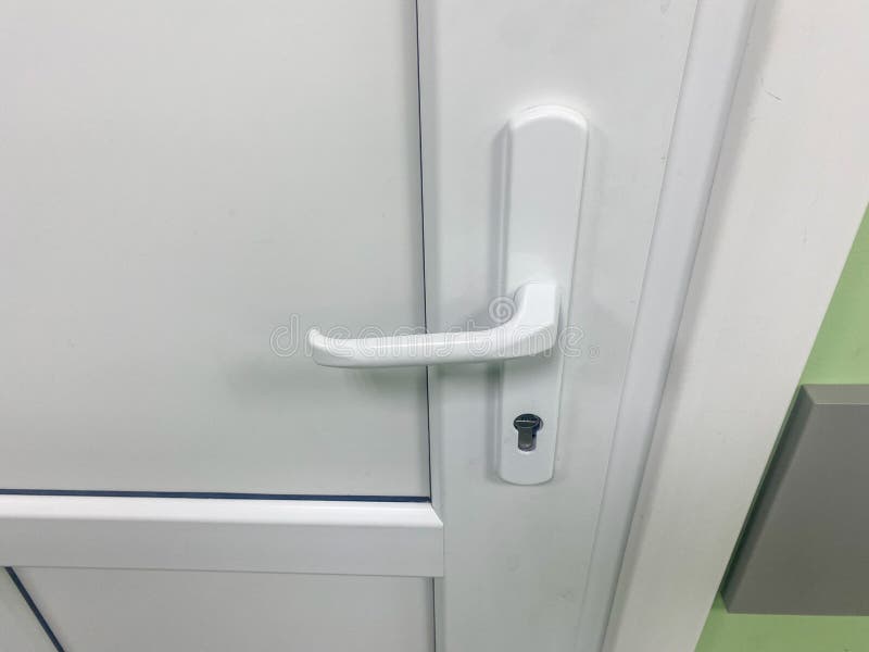 Plastic Door Handle of Plastic White Door Stock Image - Image of ...