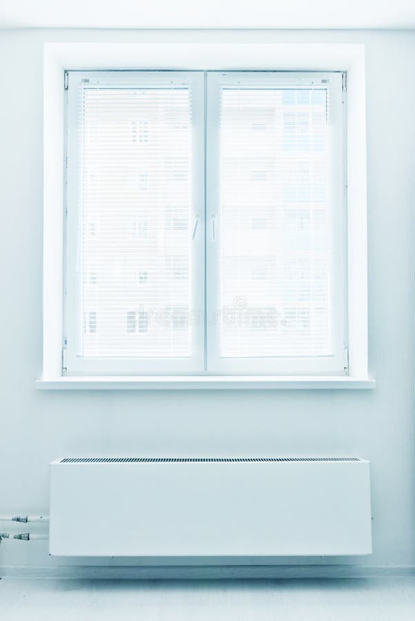Plastic Double Door Window with Radiator Under it. Stock Image - Image ...
