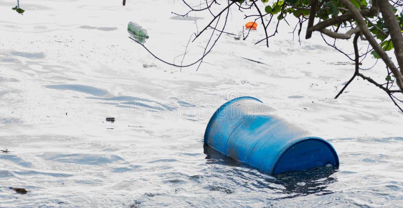 Plastic Drum Floating on a Beach Side and Other Flowing Plastic Stock ...