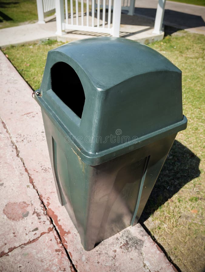 Plastic Bin Dustbin Black Sphere Shape it is Located on a Concrete ...