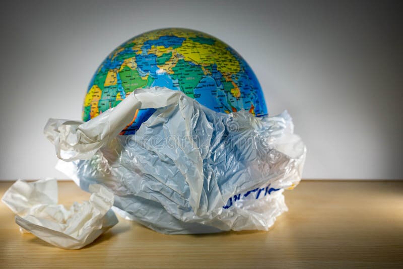 Earth Inside a Plastic and Some Garbage. Earth is Being Destroyed ...