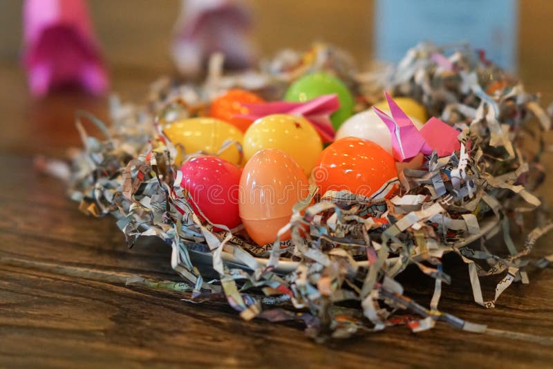 Plastic Egg Toy on Pieces of Paper Stock Image - Image of festive ...