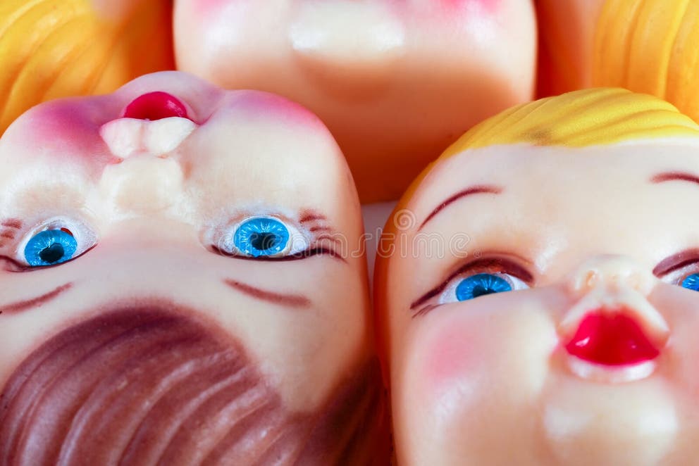 Plastic Faces stock image. Image of brown, contrast, blue - 8403725