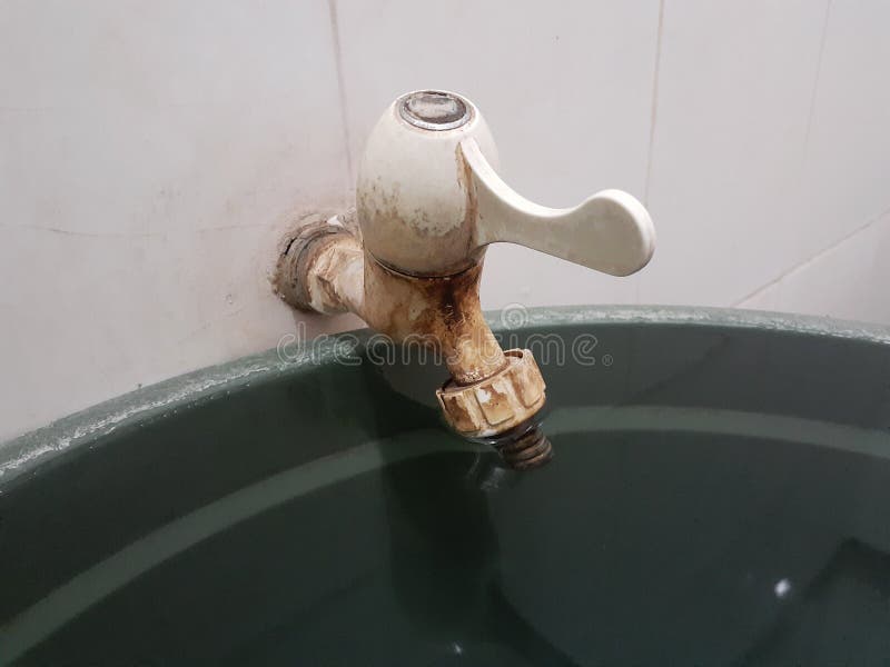 A plastic faucet stock image. Image of texture, yellow - 223963397