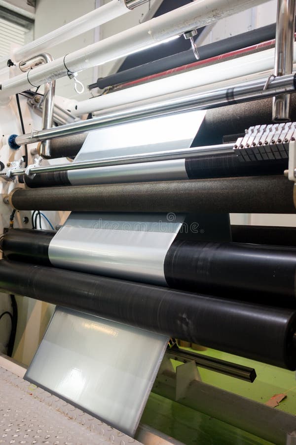 Plastic Film Rolls Inside Plastic and Aluminium Food Packaging Making ...