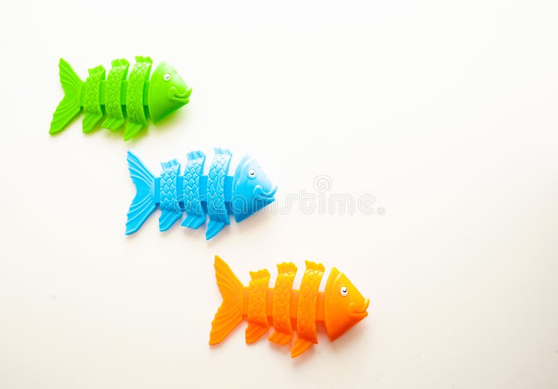 Plastic Fish Skeletons in Green, Blue and Orange Colors Stock Image ...