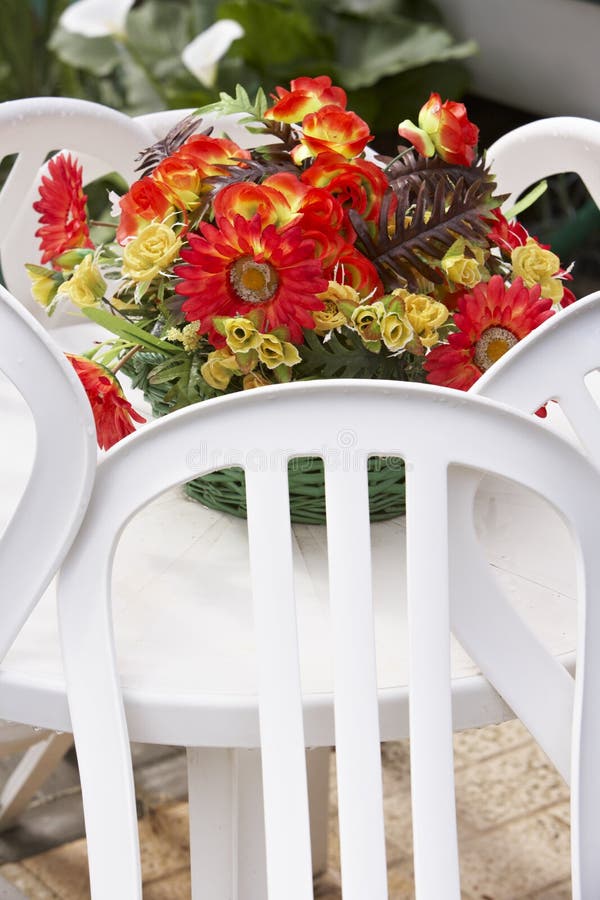Plastic flowers on table stock image. Image of relaxation - 12201171