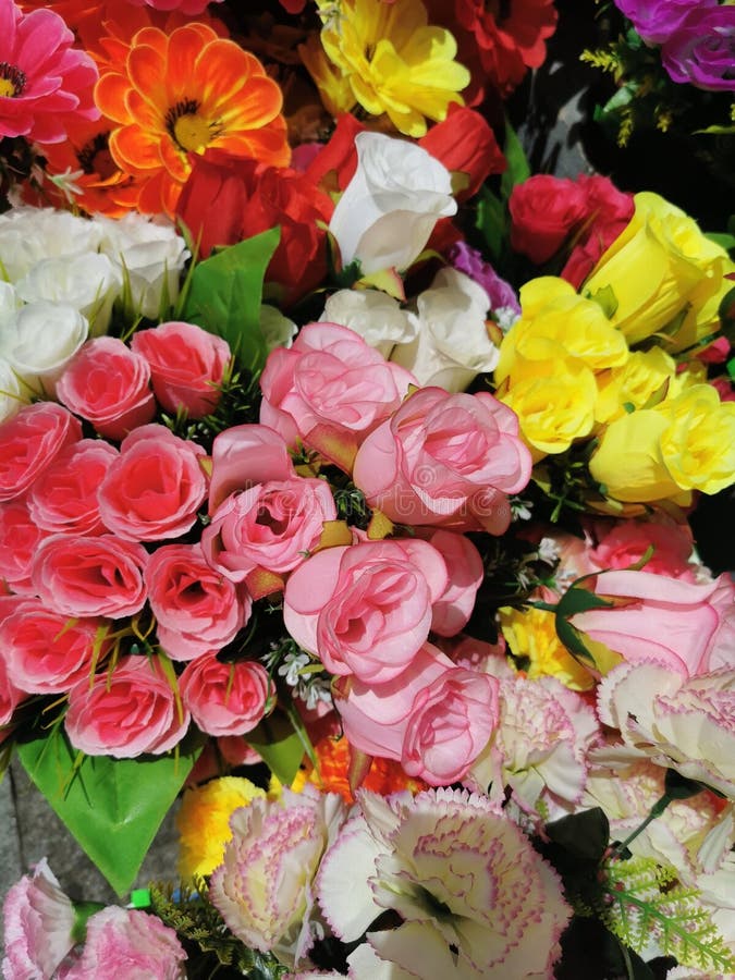 Plastic flowers texture stock image. Image of texture - 347499743