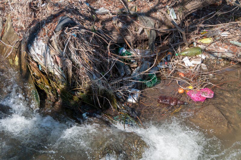 Plastic and Foam Garbage Floating on the Surface of the River Stock ...