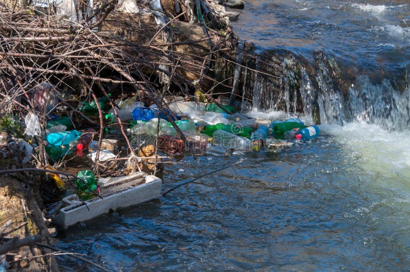 Plastic and Foam Garbage Floating on the Surface of the River Stock ...