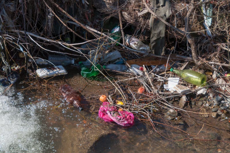 Plastic and Foam Garbage Floating on the Surface of the River Stock ...