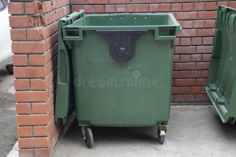 Plastic Garbage Containers.Modern Garbage Containers on the Street of ...