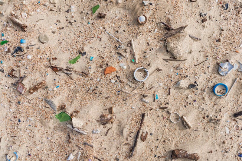 Plastic Garbage in Sand on Beach. Pollution by Microplastic Rubbish on ...