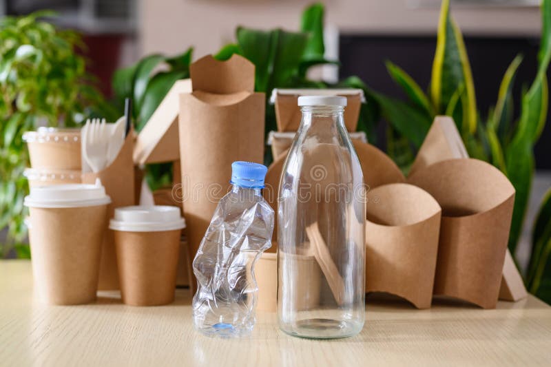 Plastic and Glass Bottle on the Background of Eco-friendly Paper ...
