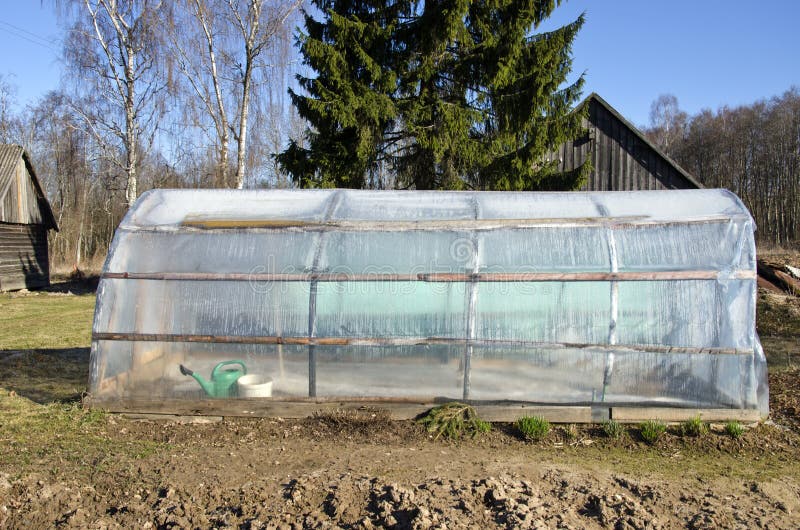 Plastic Greenhouse in Spring Farm Garden Stock Image - Image of village ...